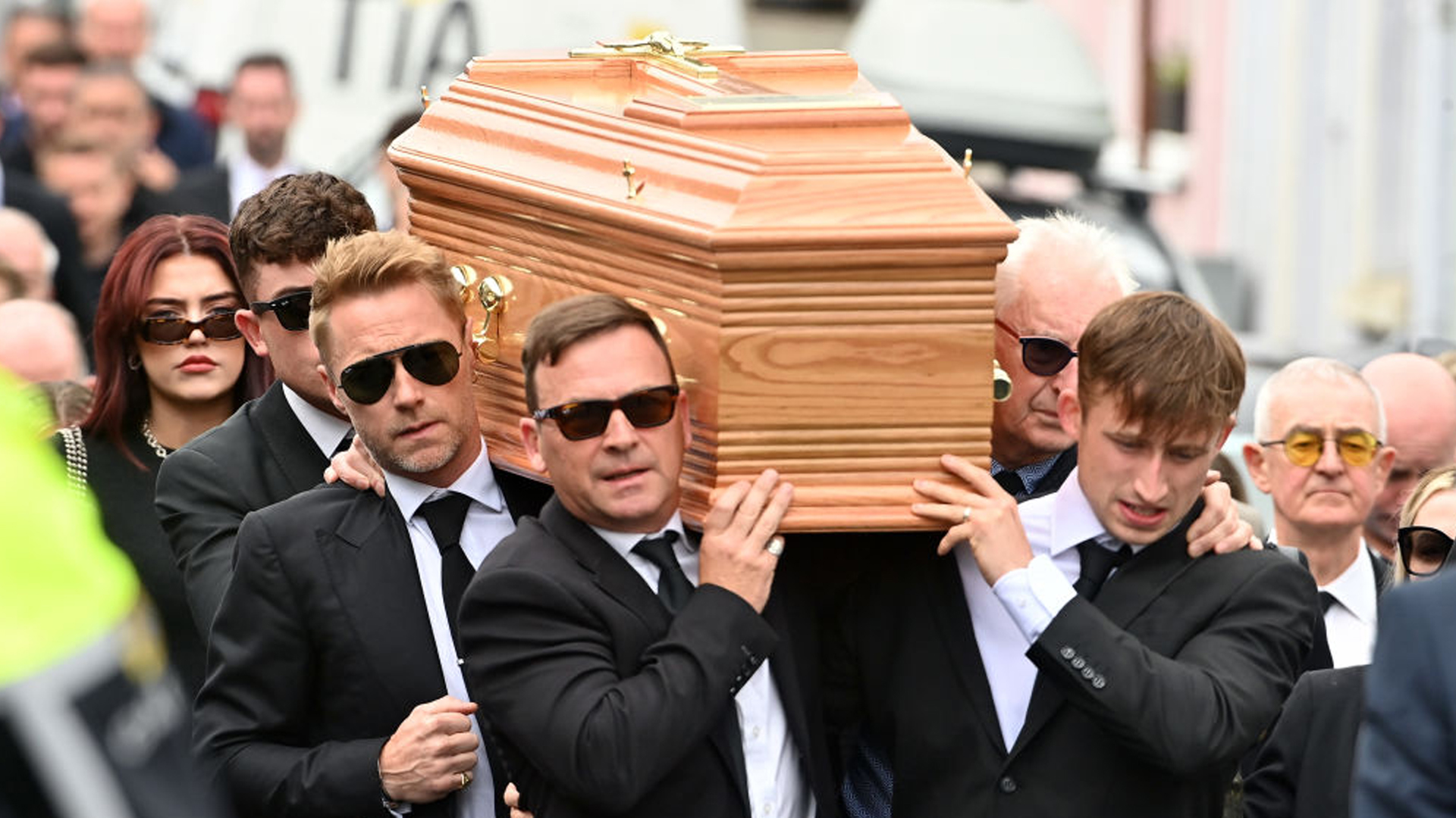 Ronan Keating sings tribute as his brother is laid to rest