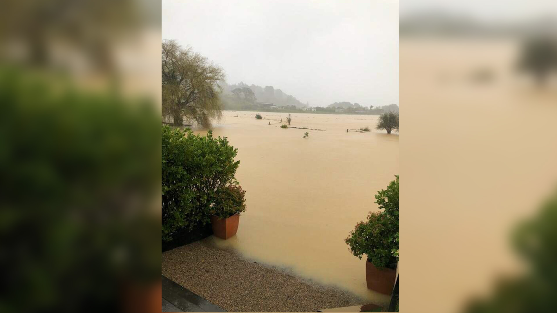 Flooding turns Coromandel Peninsula resident's home into 'lakeside ...